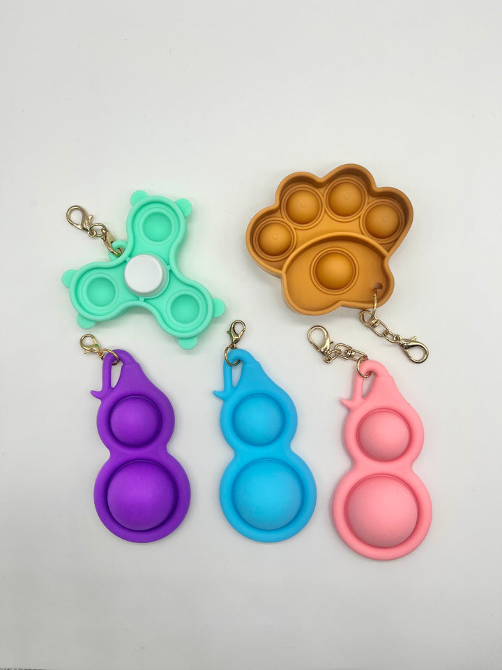 ACTOYZ | Home to the Comfort Keychain® – AC TOYZ