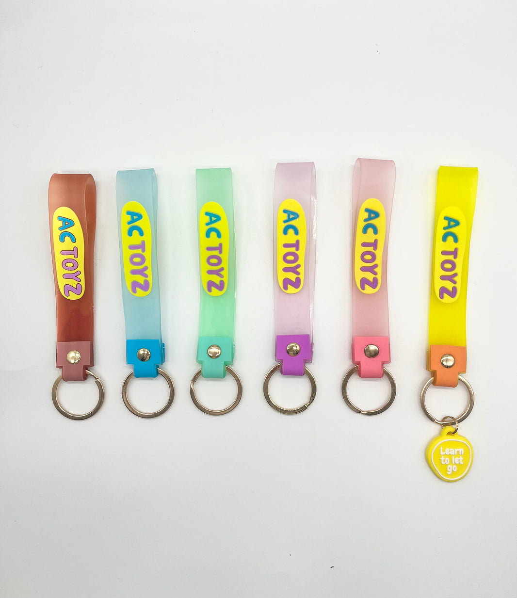 ACTOYZ | Home to the Comfort Keychain® – AC TOYZ